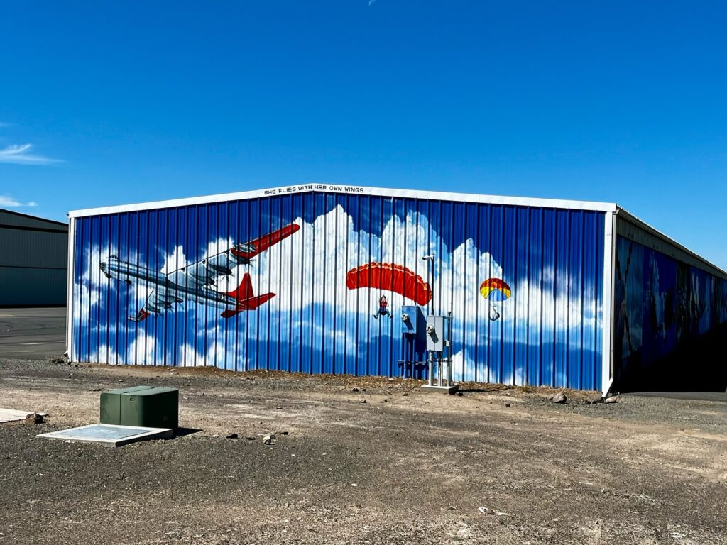 World War II Airplane Murals Painted on Oregon Airport Hangars ...